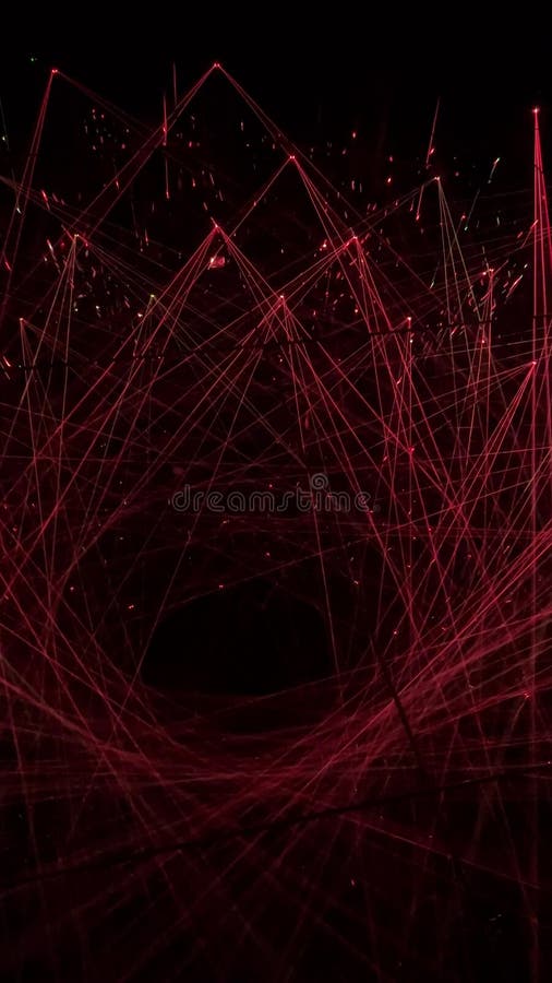 Shot of Red Laser Light Creating Patterns and Changing Colors. Stock ...