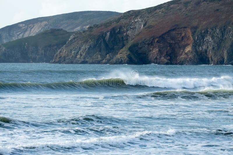 Shot of Roaring Stormy Sea Waves with Background of Beautiful Rocks ...