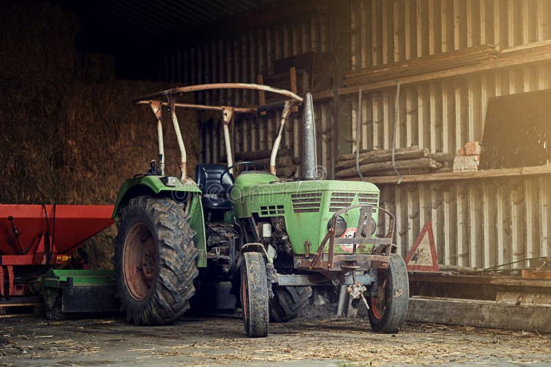 No Farm is Complete without One. Shot of a Rusty Old Tractor Standing ...