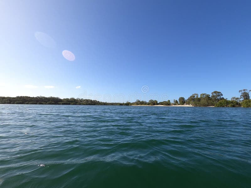 Shot of a Scenic Lake Wavy Water Surface on a Sunny Day Stock Image ...