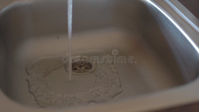 Shot of a Sink with Water Running into it from Above. Stock Footage ...