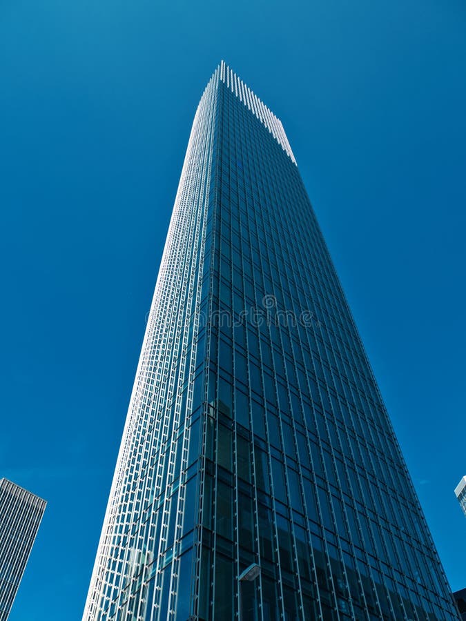 Shot between the Skyscraper Towers Racing through the Sky with Blue Sky ...