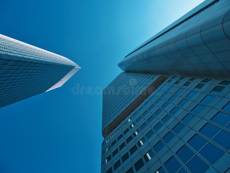 Shot between the Skyscraper Towers Racing through the Sky with Blue Sky ...