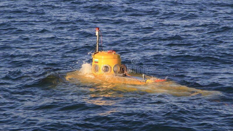 A Shot of a Small Yellow Submarine is Resurfacing Stock Photo - Image ...