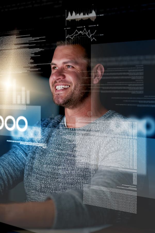 Watching His Code in Action. Shot of a Smiling Computer Programmer ...