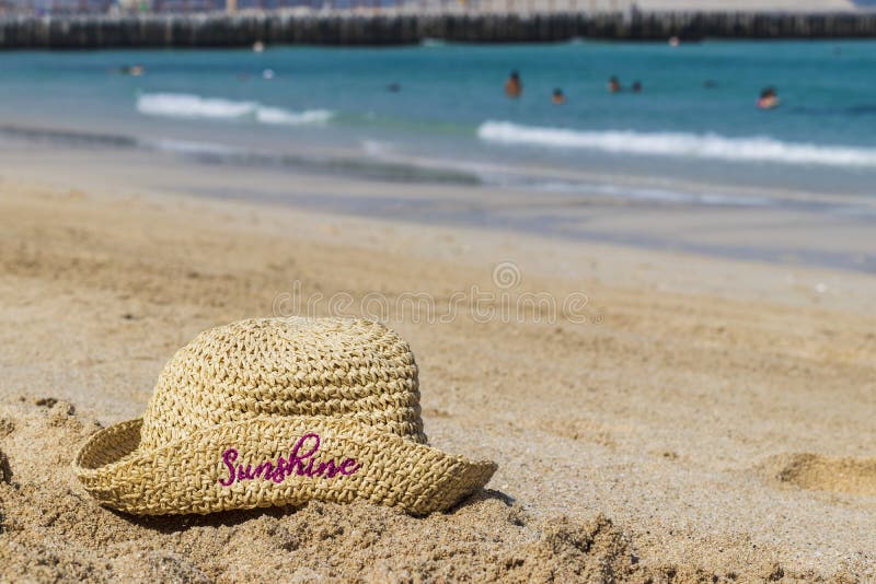 Shot of a Straw Hat on the Sand at the Beach. Holiday Stock Image ...