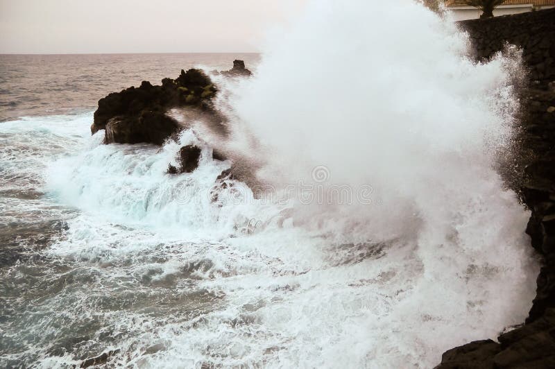 Shot of a Strong Wave Hitting a Cliff on the Coast Side Stock Image ...