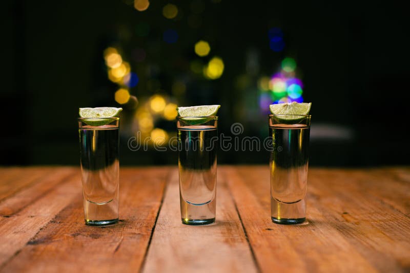 Shot of Tequila on a Wooden Table Stock Photo - Image of agave ...