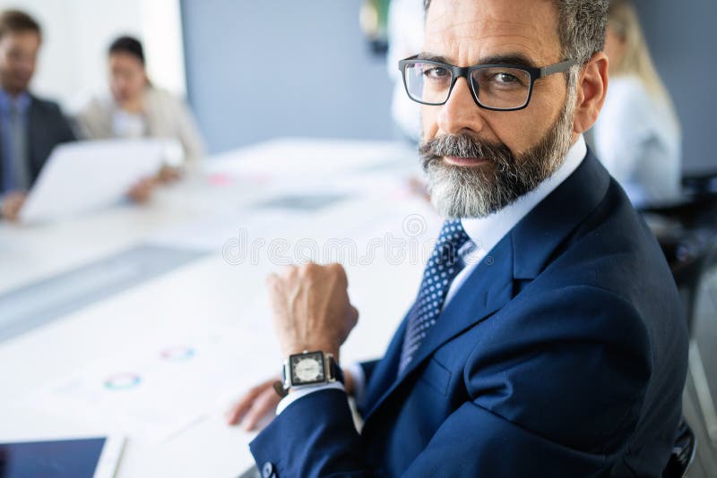 Shot of Thinking Financial Advisor Businessman Working in Office. Stock ...