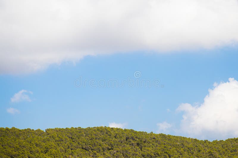 Shot of the Top Part of the Hill and the Blue Sky, Partly Covered with ...