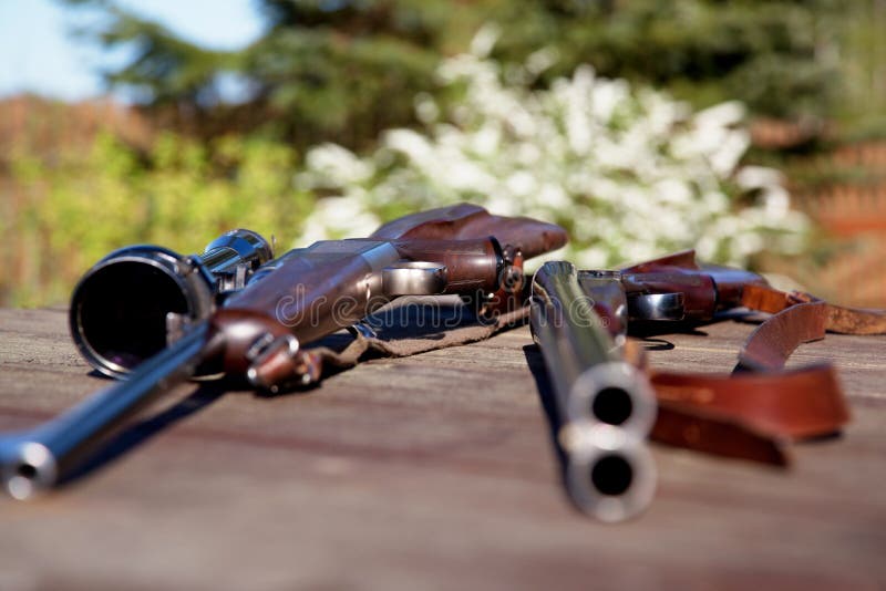 The Weapons of Choice for an Expert Hunter. Shot of Two Guns Lying on a ...