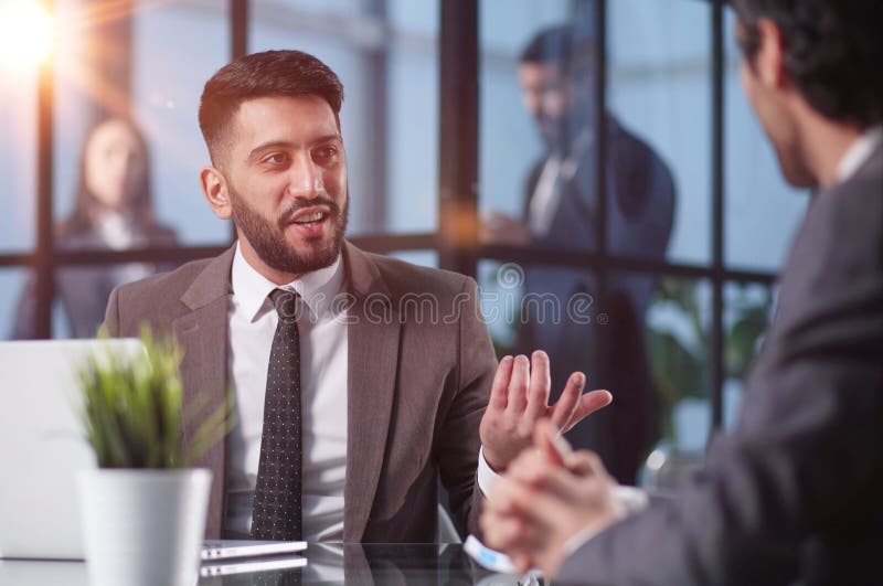 Shot of Two Young Male Having a Conversation in a Modern Office. Stock ...