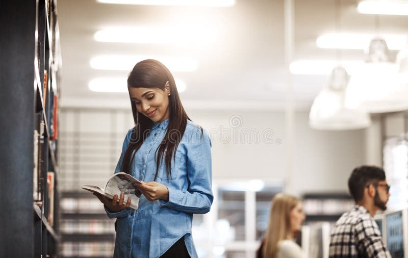 This Book Might Help with My Research. Shot of a University Student ...
