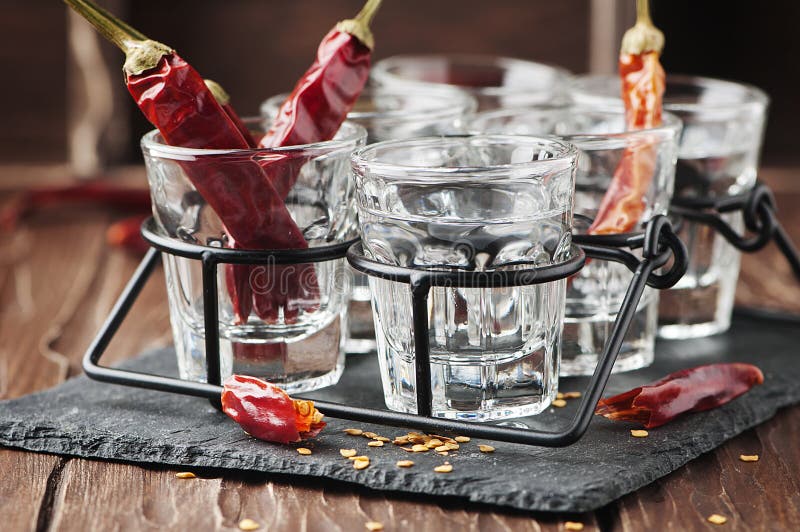 Shot of Vodka and Chili Peppers Stock Photo - Image of pepper, beverage ...