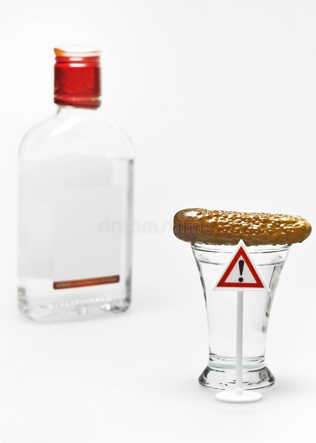 A Shot of Vodka with Cucumber and a Warning Exclamation Sign Stock ...