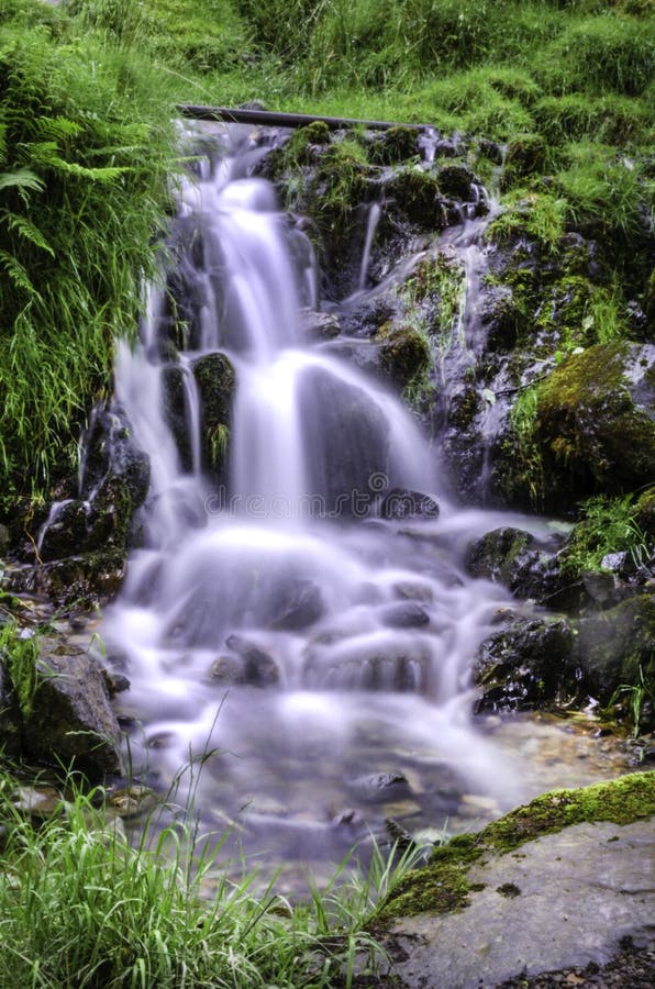 A Shot of a Waterfall Flowing Down the Hillside in the Lake District ...