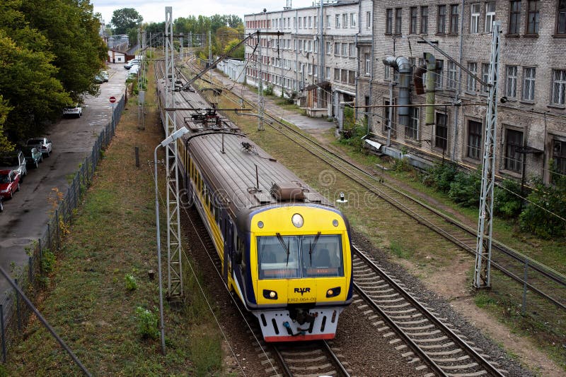 Shot of a Yellow Train on a Rail Editorial Stock Image - Image of road ...