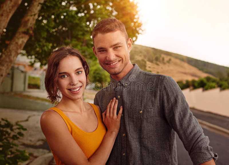 They Look Good Together. Shot of a Young Couple Spending Time Outdoors ...