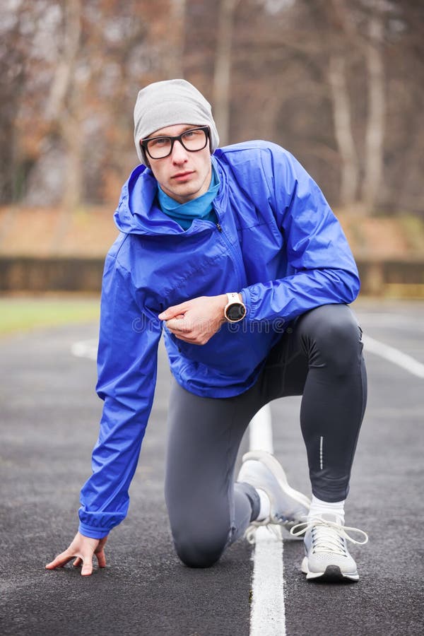 Shot of a Young Handsome Professional Runner Looking at Camera. Stock ...