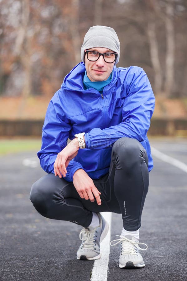 Shot of a Young Handsome Professional Runner Looking at Camera. Stock ...