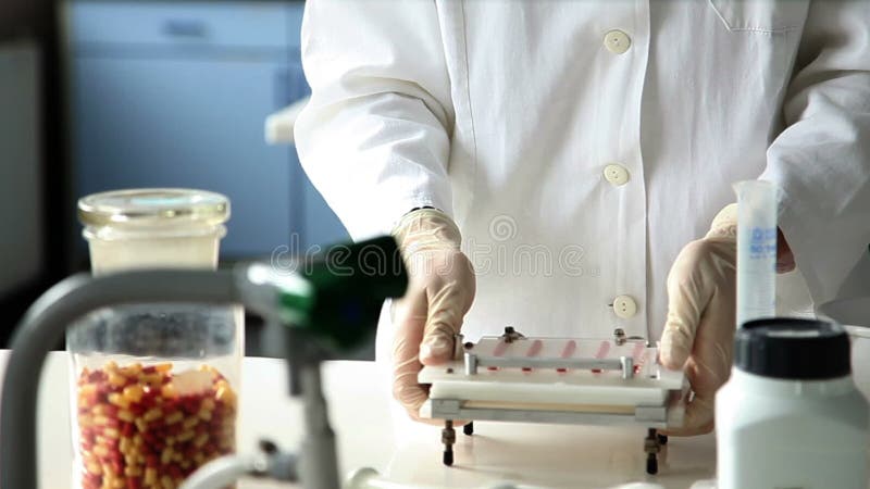 Shot of the Young Pharmacists Making Pills Stock Footage - Video of ...