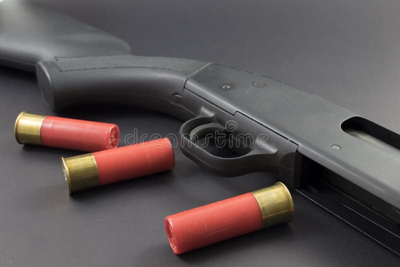 A Shotgun with Red Shotgun Shells Stock Image - Image of firearms ...