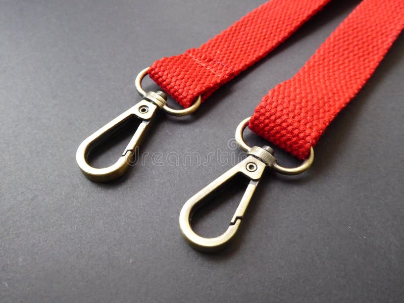 Shoulder Band Clips for Bags. Red Band with Gold Clips Stock Photo ...