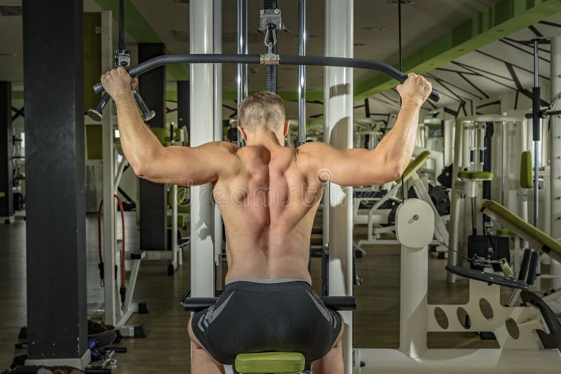 Shoulder Pull Down Exercise Stock Image - Image of bodybuilder, chest ...
