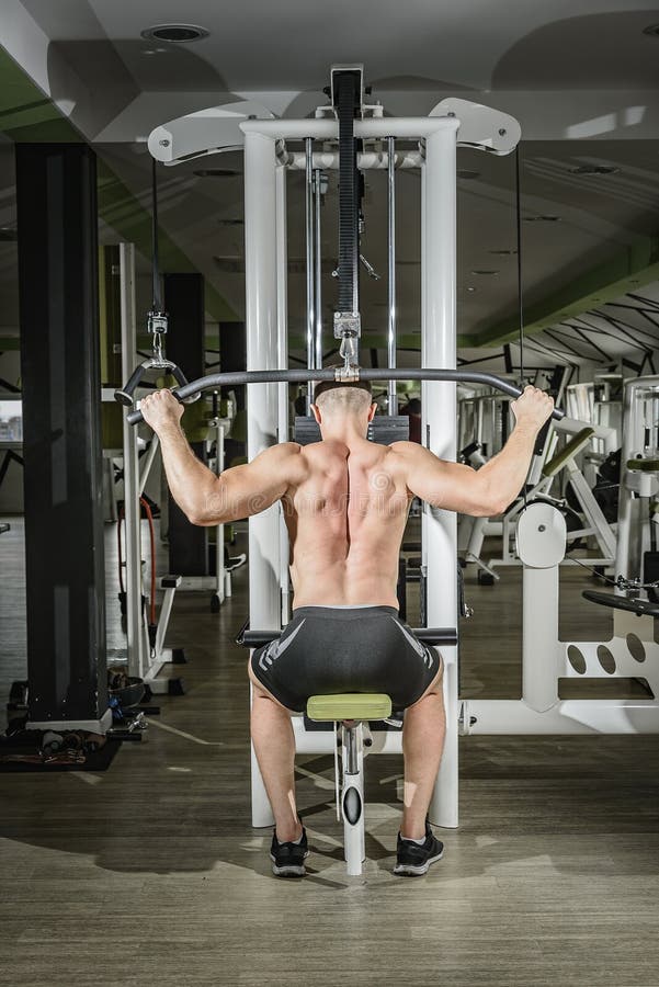 Shoulder Pull Down Exercise Stock Image - Image of cable, physical ...