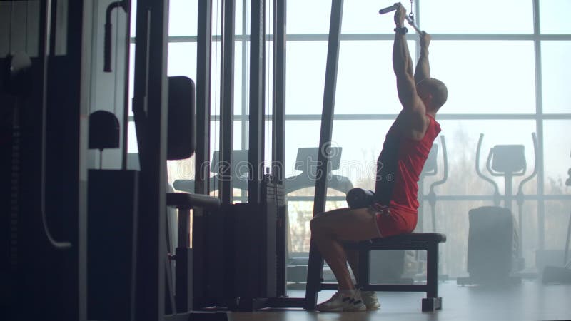 Shoulder Pull Down Machine. Man Working Out Lat Pulldown Training at ...