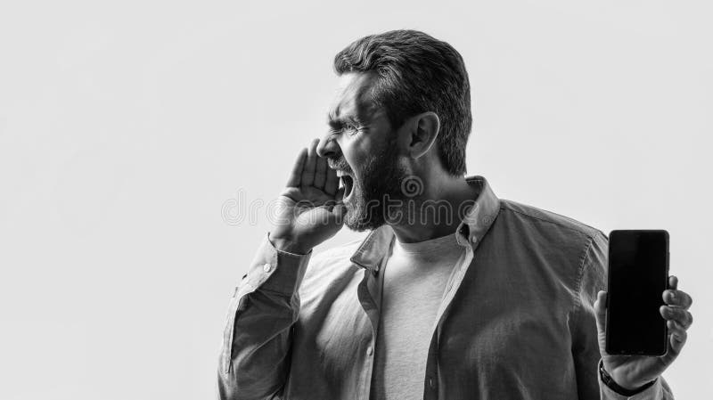Shouting Man Showing Phone App Isolated on Studio Background. Man ...