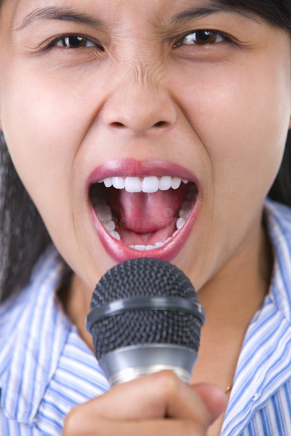 Shouting with microphone stock photo. Image of microphone - 7616768