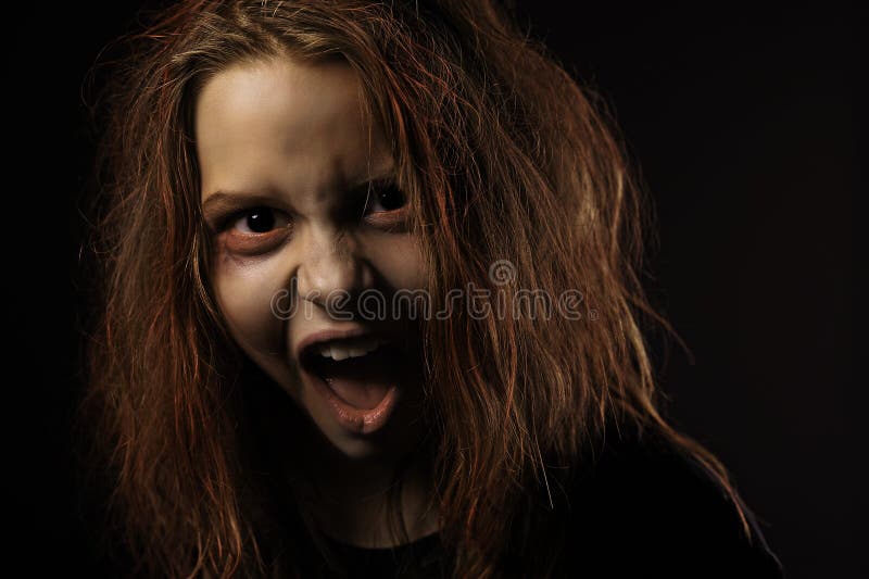 Girl Possessed by a Demon with a Sinister Smile Stock Photo - Image of ...