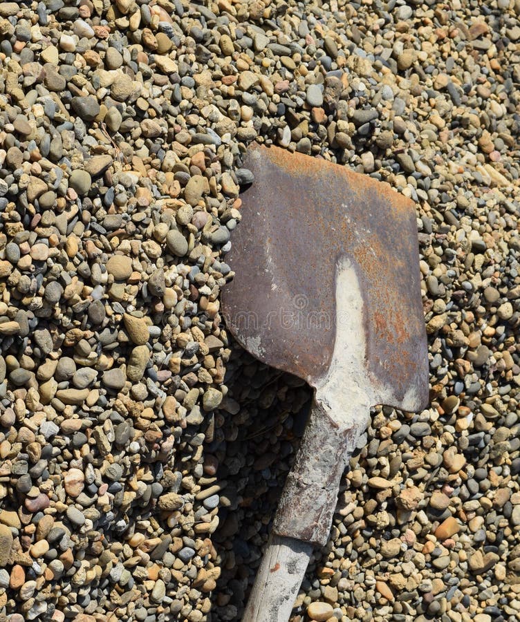 Shovel on crushed stone stock image. Image of decoration - 156415093