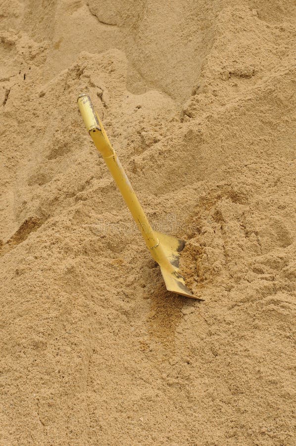 A shovel digging into pile stock image. Image of tool - 26157655
