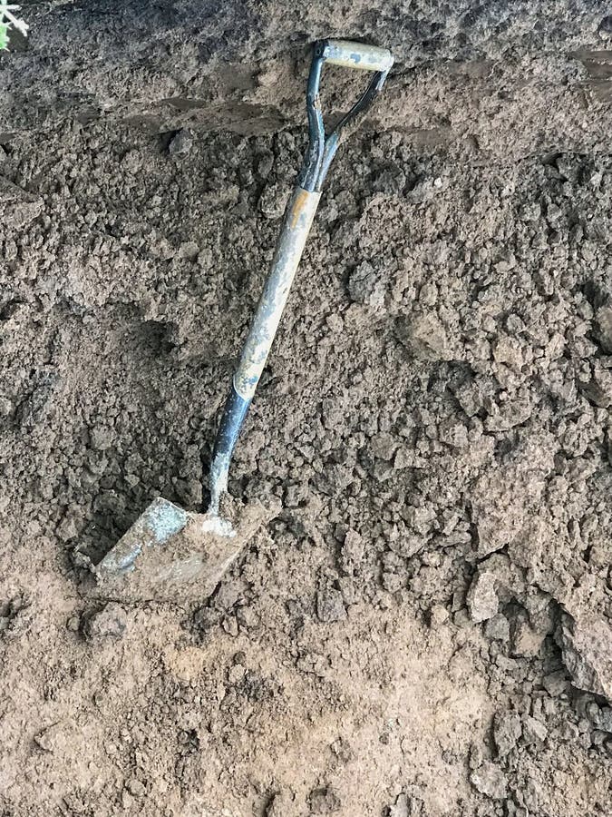 Shovel in digging a well stock photo. Image of dirt - 331151892