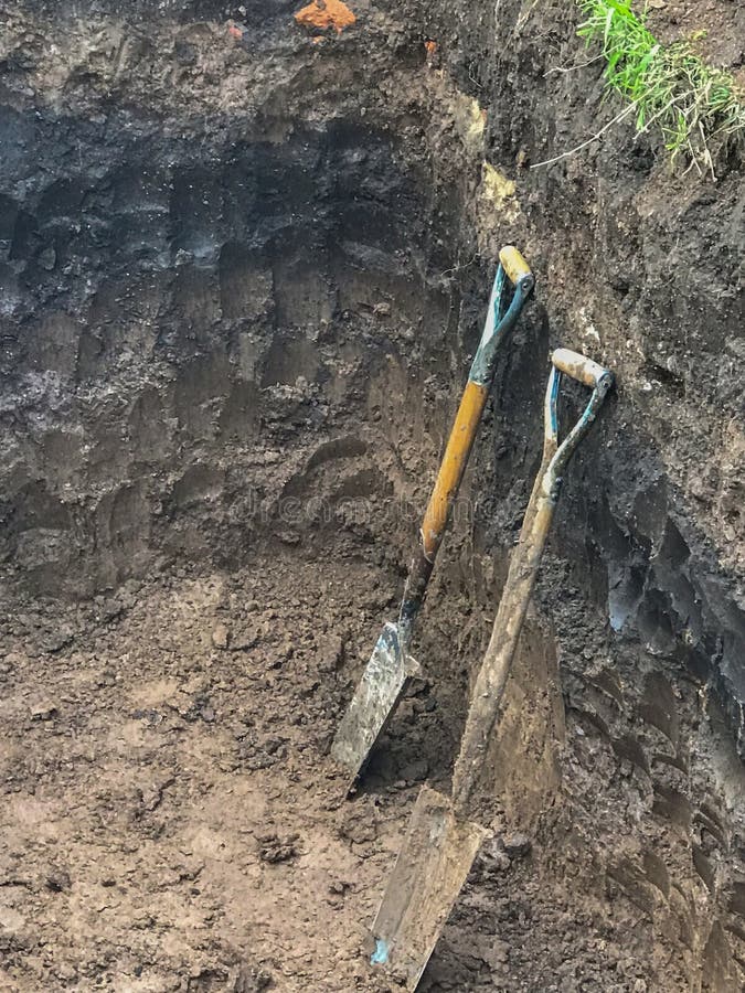 Shovel in digging a well stock image. Image of earth - 331151915