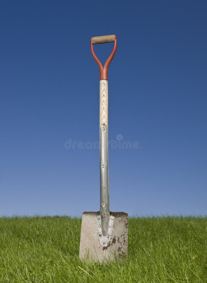 Shovel in green grass stock photo. Image of gardening - 10934216