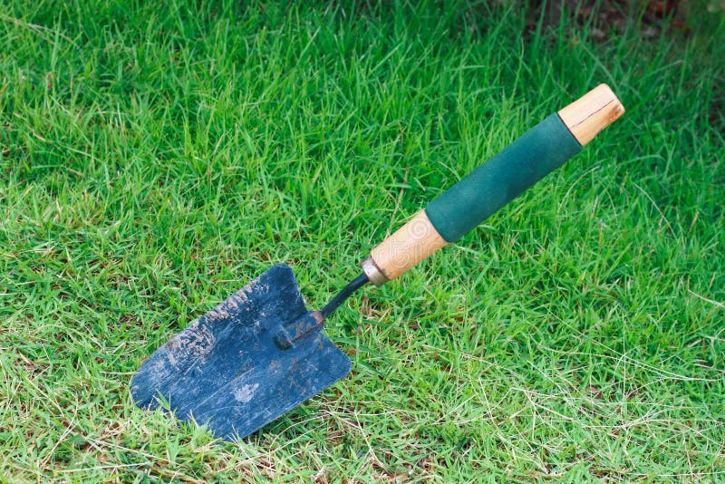 Shovel on Green Grass Field Stock Photo - Image of digging, nature ...