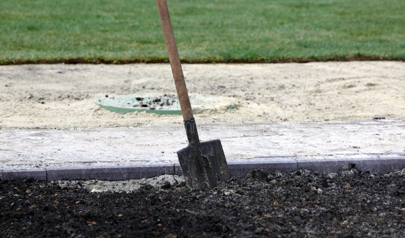 Shovel in the ground stock photo. Image of gardener, equipment - 47172508