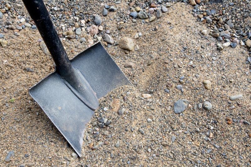 Shovel Placed on a Pile of Stone for Construction Work. it is Used for ...