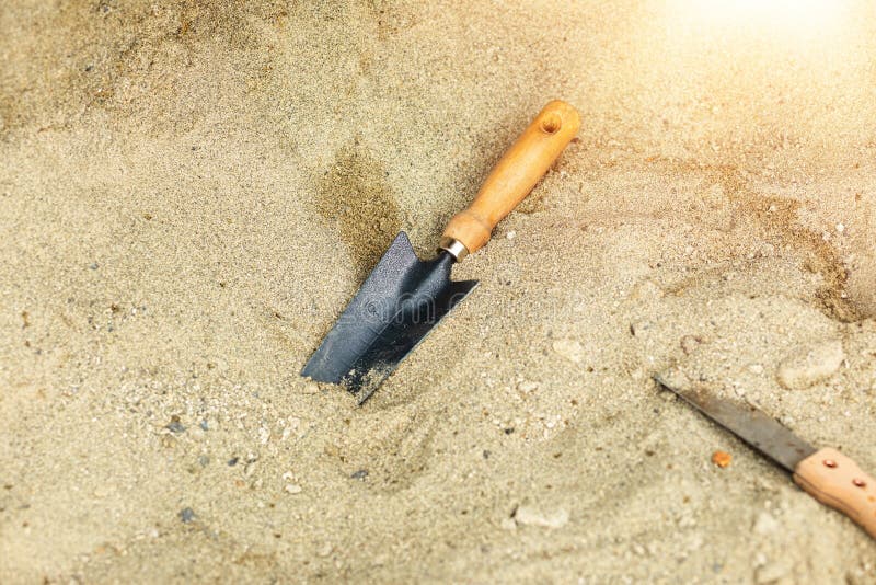 Shovel in the Sand.Skeleton and Archaeological Tools.Digging for ...