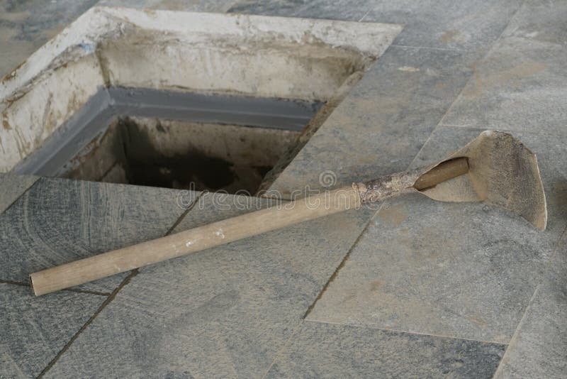 A Shovel and Spade on the Floor of a Construction Site Stock Image ...