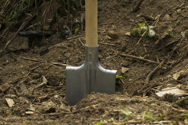Shovel is Stuck into the Ground in the Pit Stock Photo - Image of ...