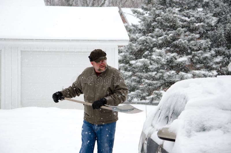 Shoveling out the car stock image. Image of michigan - 29583375