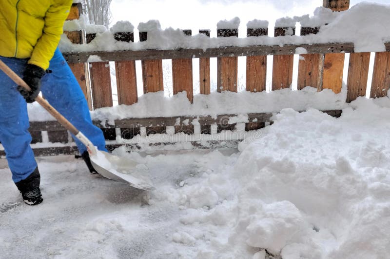 Shovelling the snow stock image. Image of snow, shoveling - 84330741