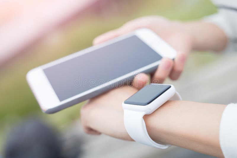 Show Smart Watch and Cellphone Stock Photo - Image of cellphone, phone ...