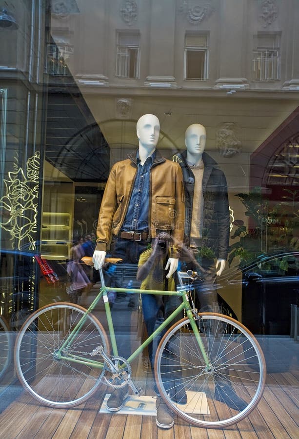 Young Man Standing Above a Shop Show-window. Stock Image - Image of ...