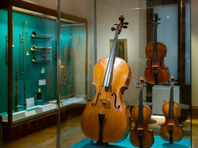 Showcase with Bowed String Instruments in Weltmuseum Wien, Austria ...