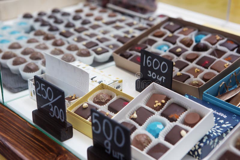 Showcase with chocolate stock image. Image of dessert - 84524669
